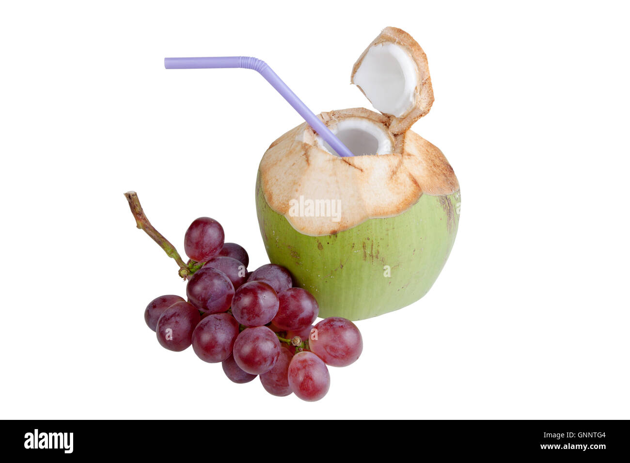 Coconut water drink and red grapes. Isolated on white objects with ...