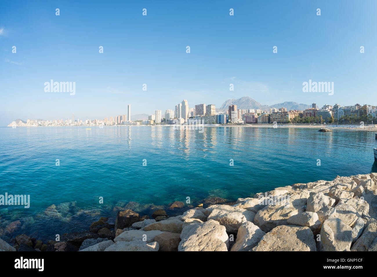 Sunny summer day on Benidorm beach, Spains major tourist resort Stock ...