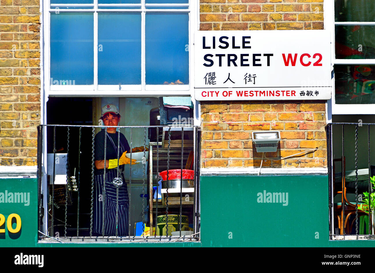 London, England, UK. Lisle Street, Chinatown. Upstairs kitchen in a ...