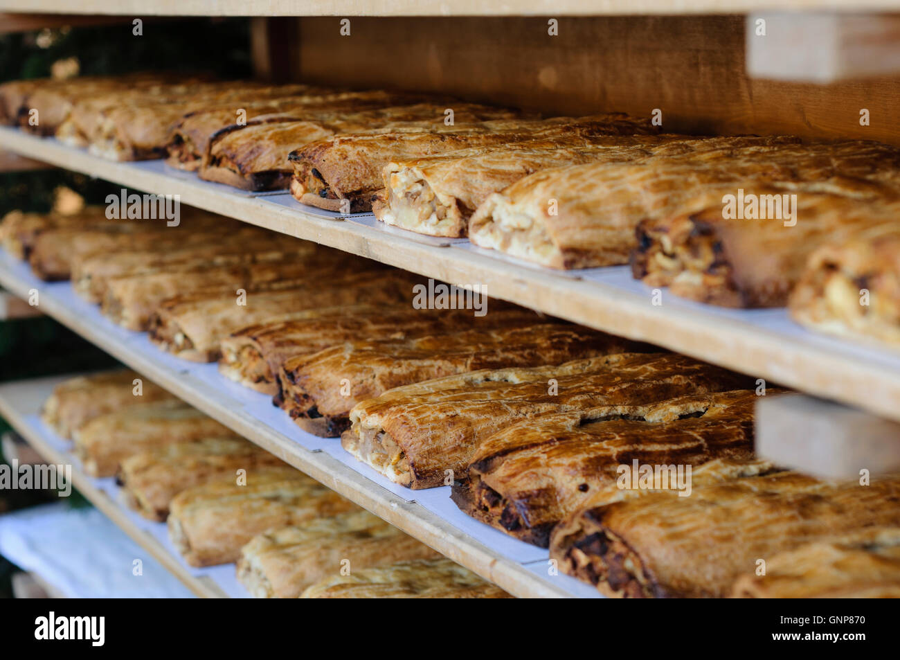 Racks full of traditional strudel in a bakery Stock Photo - Alamy