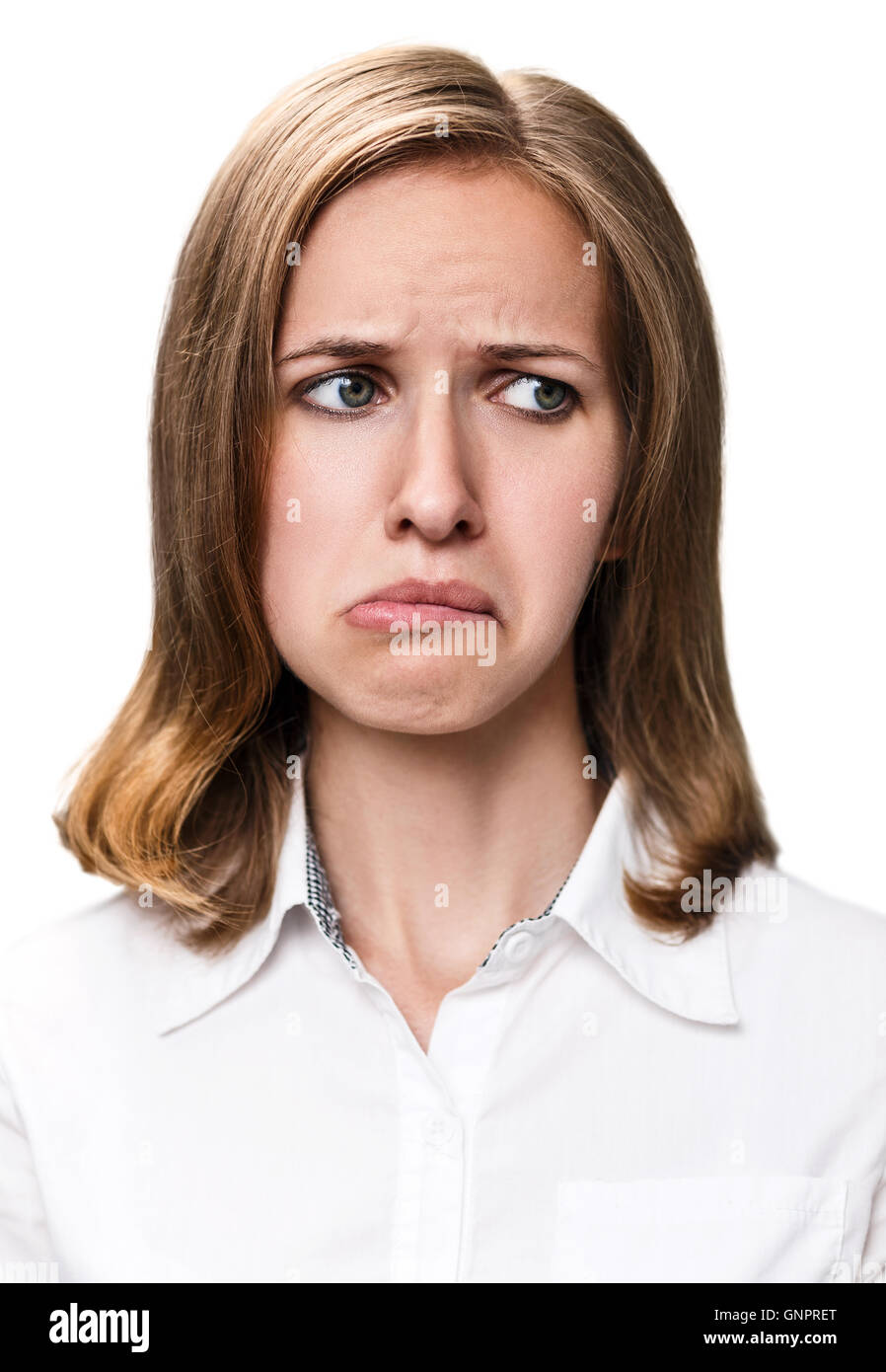 Young woman doing a pout expression isolated on white background Stock ...