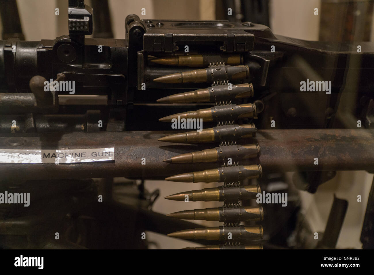 A decommissioned World War II German machine gun with bullets, on ...