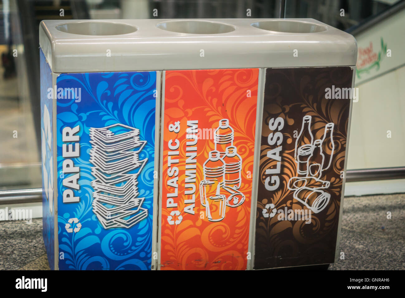 colorful recycle bins - paper, plastic, glass Stock Photo - Alamy