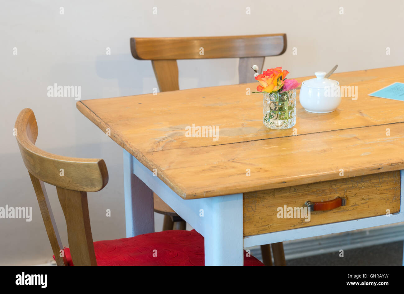 Berlin, Germany, wooden table with chairs Stock Photo - Alamy