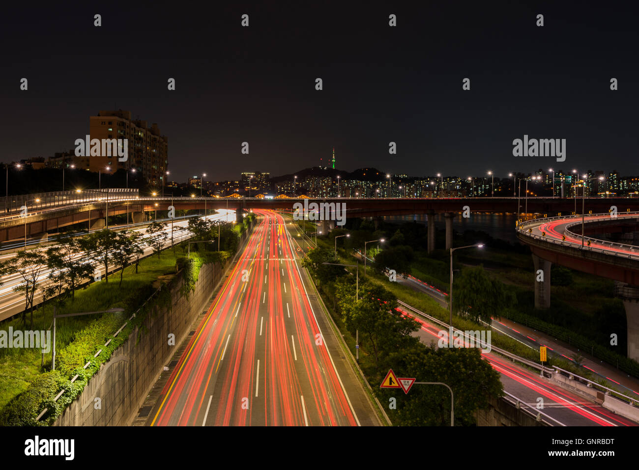 Traffic light trails on motorway highway at night in Seoul ,South Korea ...