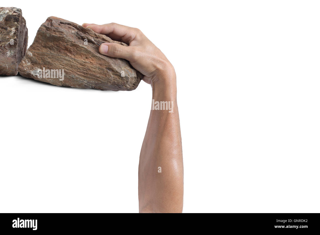 Hand clinging on rock Business concept Stock Photo - Alamy