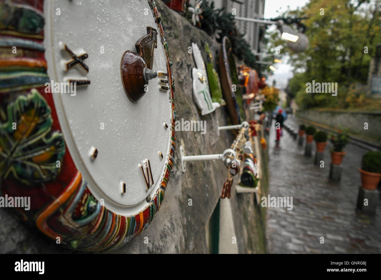 Street art clock on the way to Montmartre Basilica - Paris - France ...