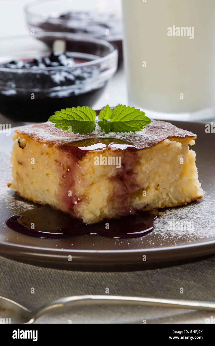 traditional homemade baked rice pudding with syrup Stock Photo - Alamy