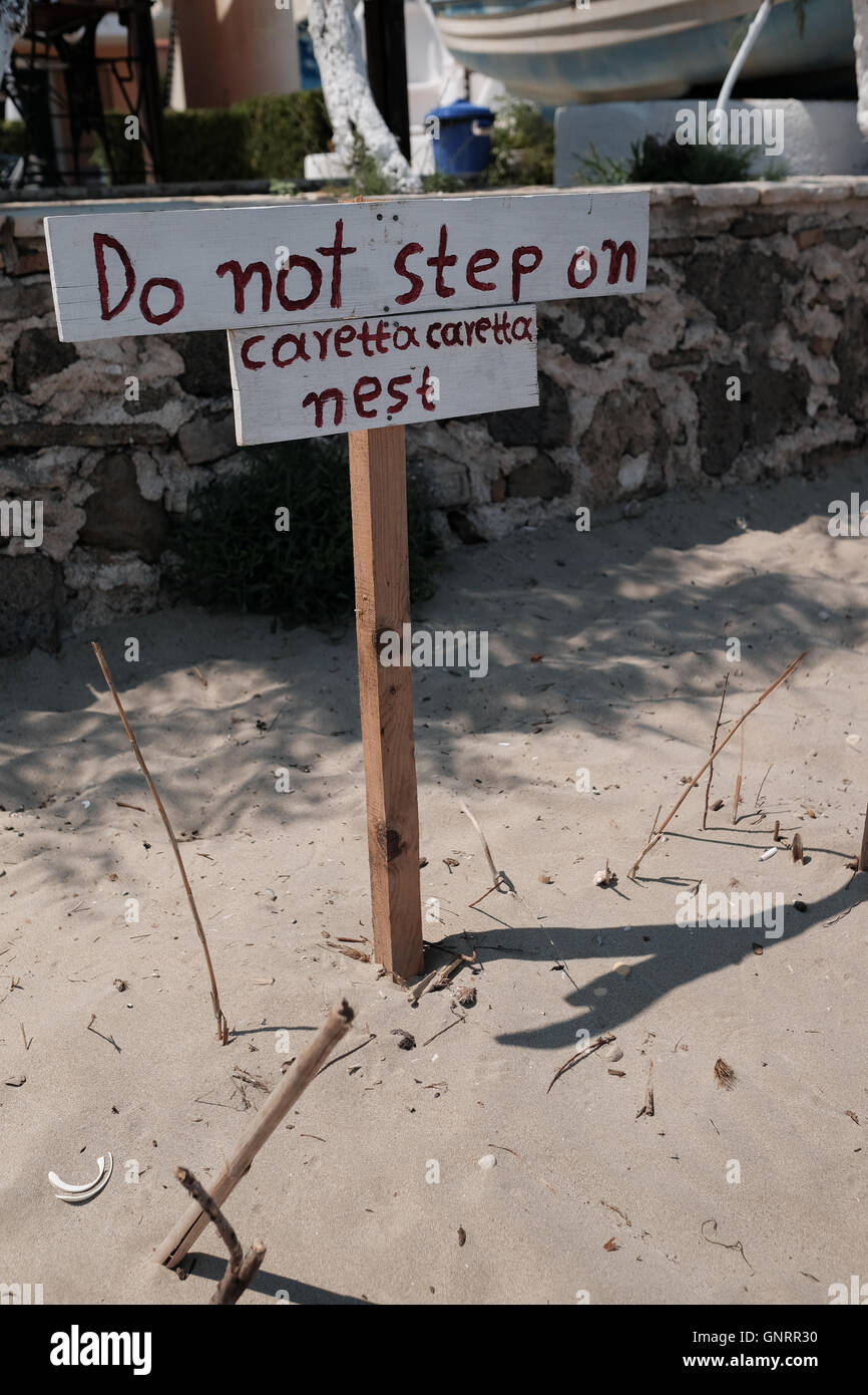 Warning marking out a Turtle nest on a beach in Zante Greece Stock ...