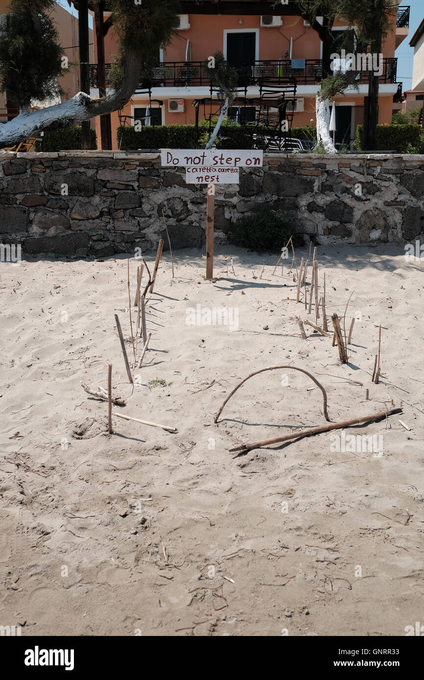 Warning marking out a Turtle nest on a beach in Zante Greece Stock ...