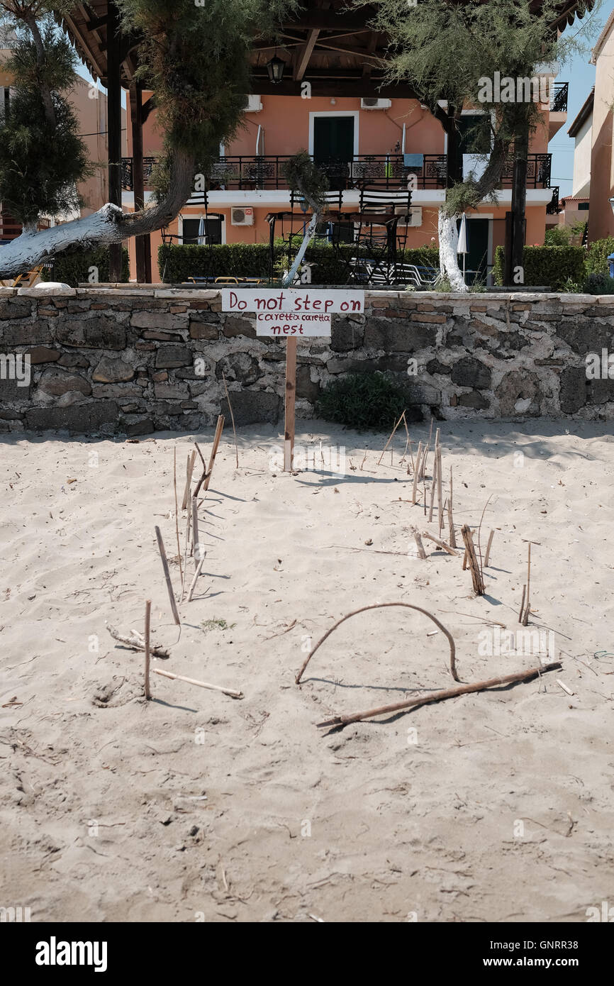 Warning marking out a Turtle nest on a beach in Zante Greece Stock ...