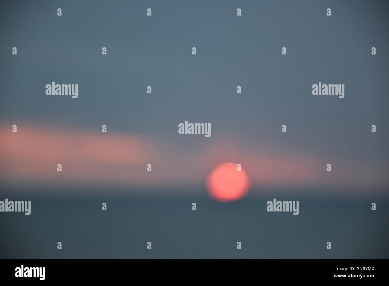 Blurry sunset over the Pacific Ocean Stock Photo - Alamy