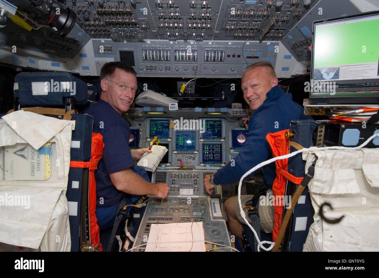 Space Shuttle Atlantis Commander Chris Ferguson and pilot Doug Hurley ...