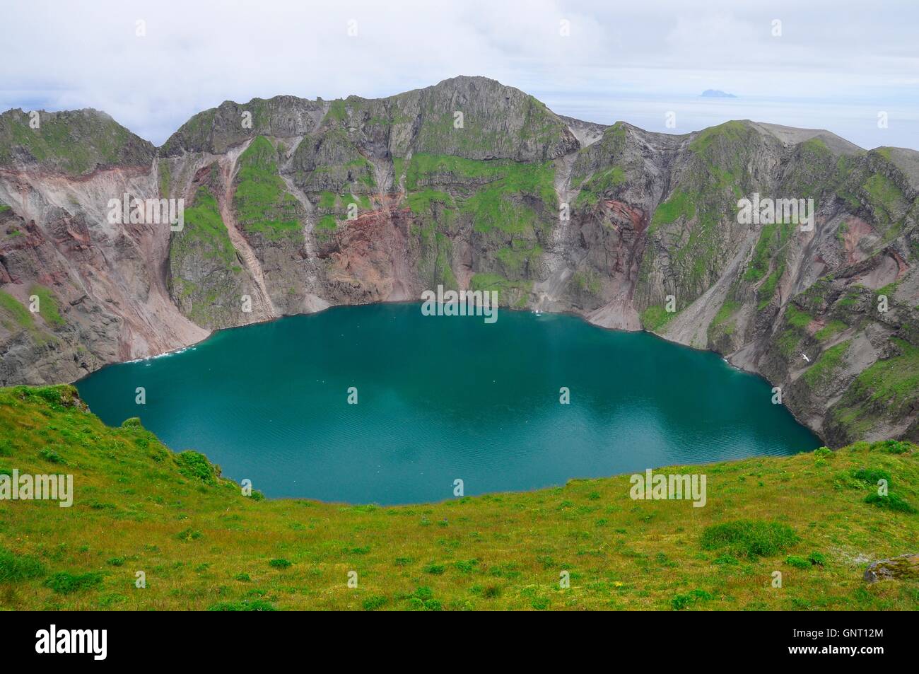 Aerial view of the volcanic caldera lake of Kasatochi Island less than ...