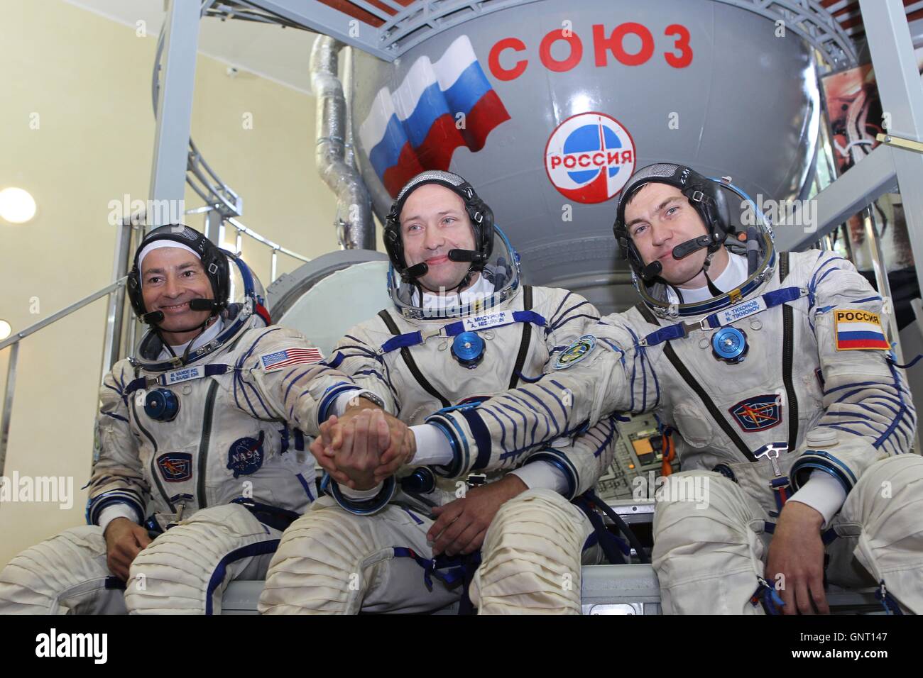 Putting On Orlan Space Suit