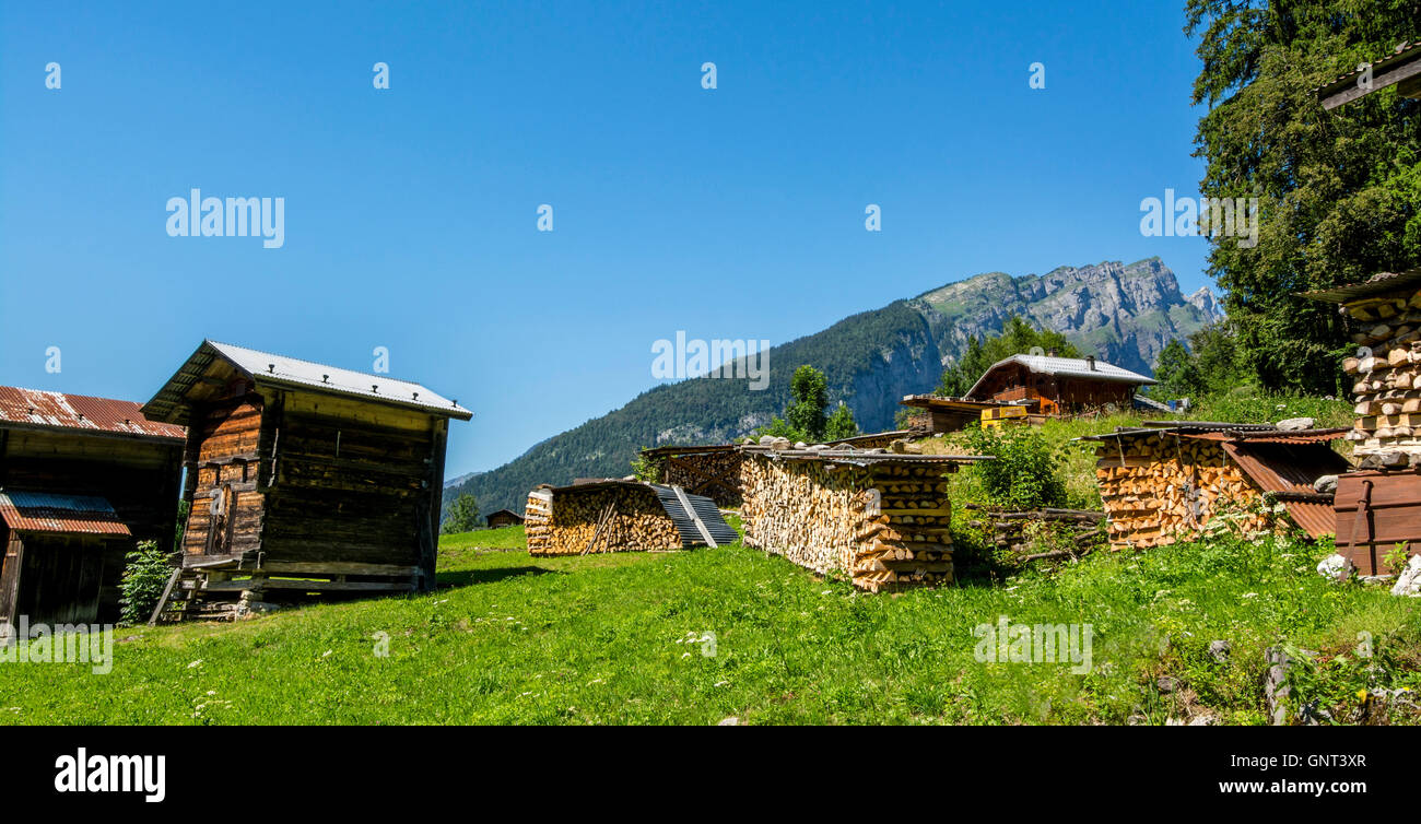 Wooden hut and wood pile. Village of Salvagny - Sixt-Fer-à-Cheval ...