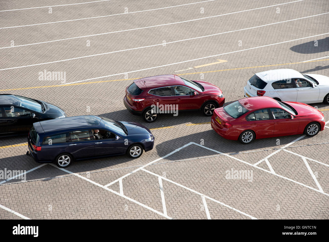 An overview of a double lane of queuing cars Stock Photo - Alamy
