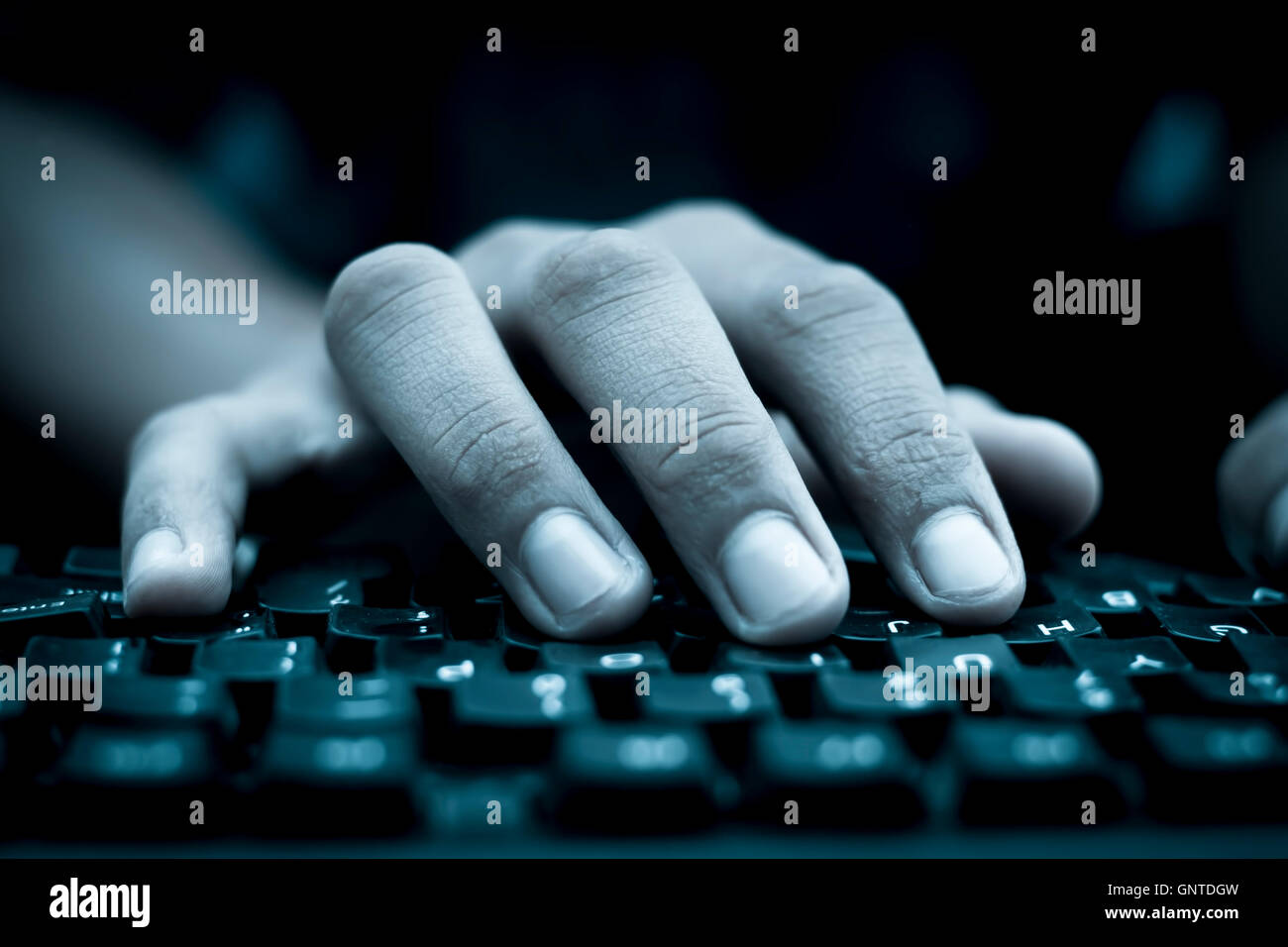 Human hand on keyboard,isolated, selective focus, shallow depth of ...