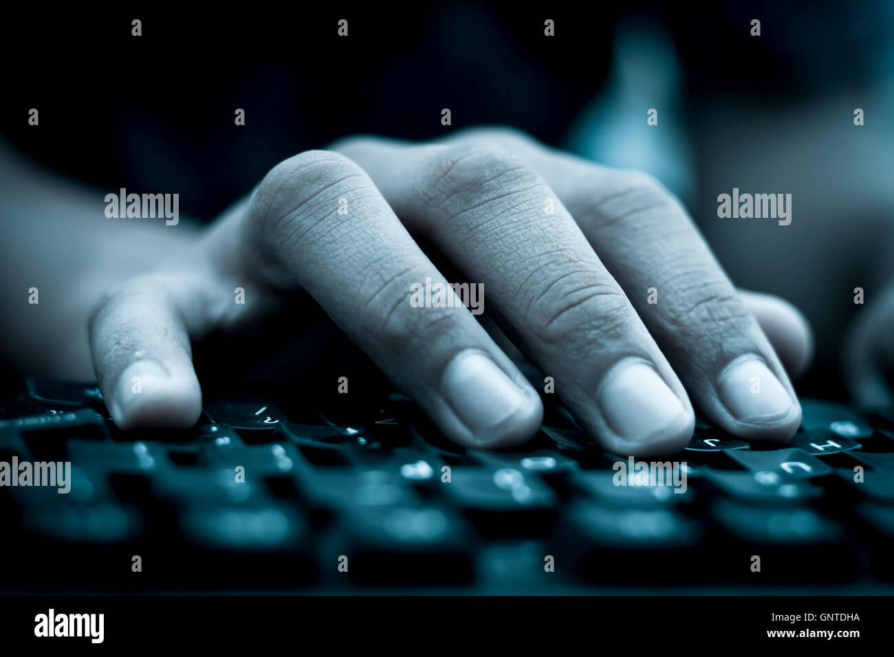 Human hand on keyboard,isolated, selective focus, shallow depth of ...