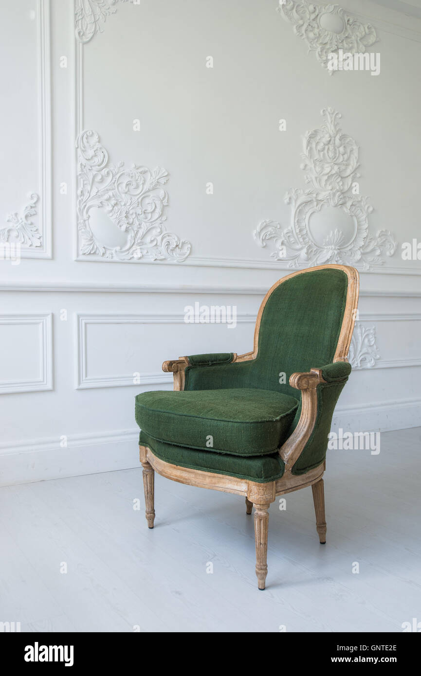 elegant green armchair in luxury clean bright white interior Stock ...