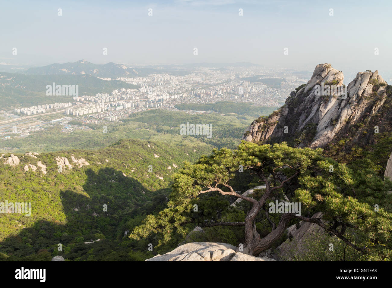 View of city from above & granite peaks of Jaunbong Peak on Dobongsan ...
