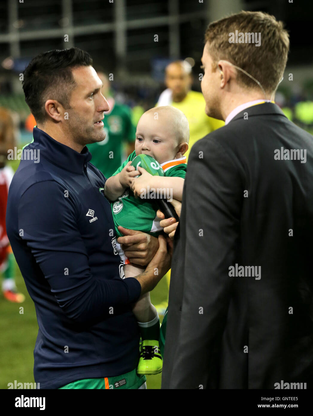 Republic of Ireland's Robbie Keane's son Hudson eats a journalist's ...