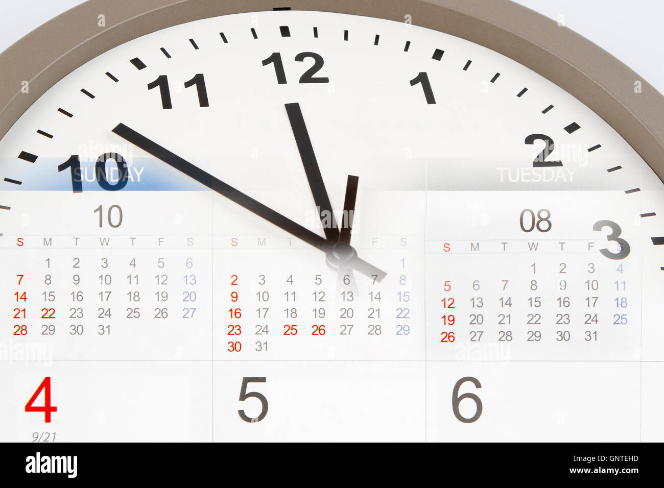 Clock face and calendar composite Stock Photo - Alamy