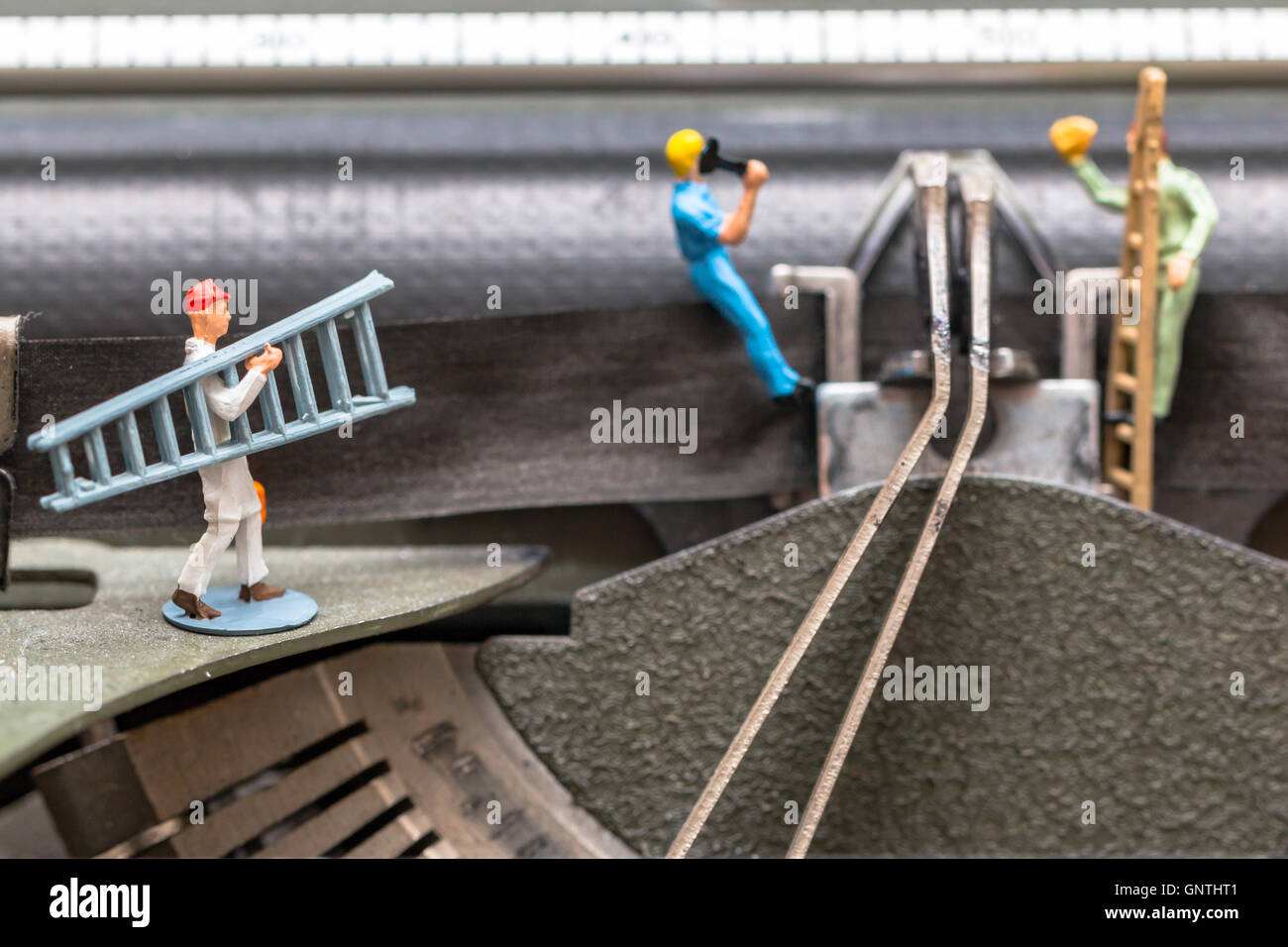 team of miniature people working Stock Photo - Alamy