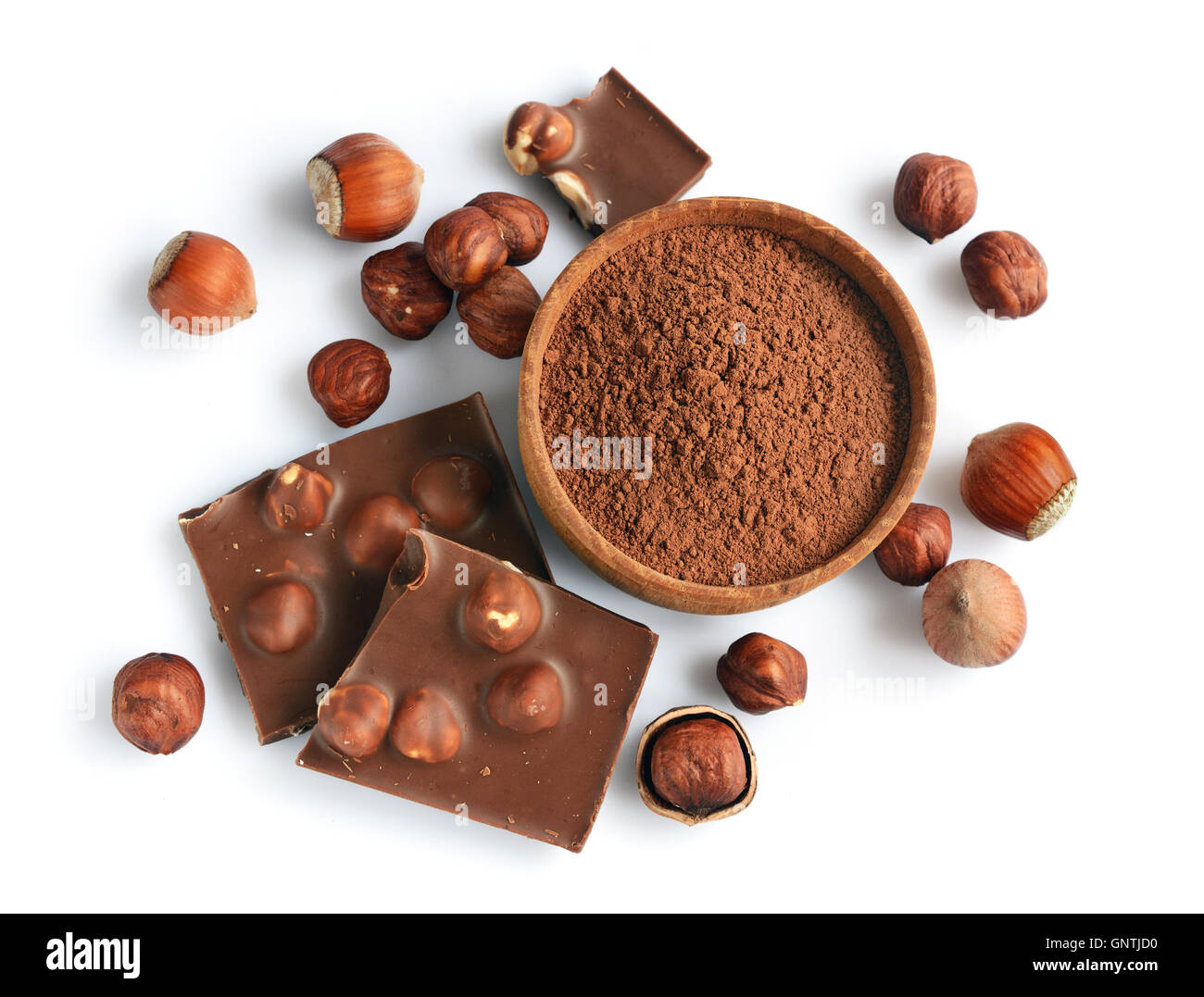 Chocolate with hazelnut and cocoa powder isolated on a white background ...