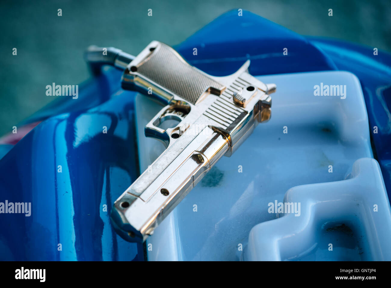 Plastic toy gun for arcade video game, selective focus Stock Photo - Alamy