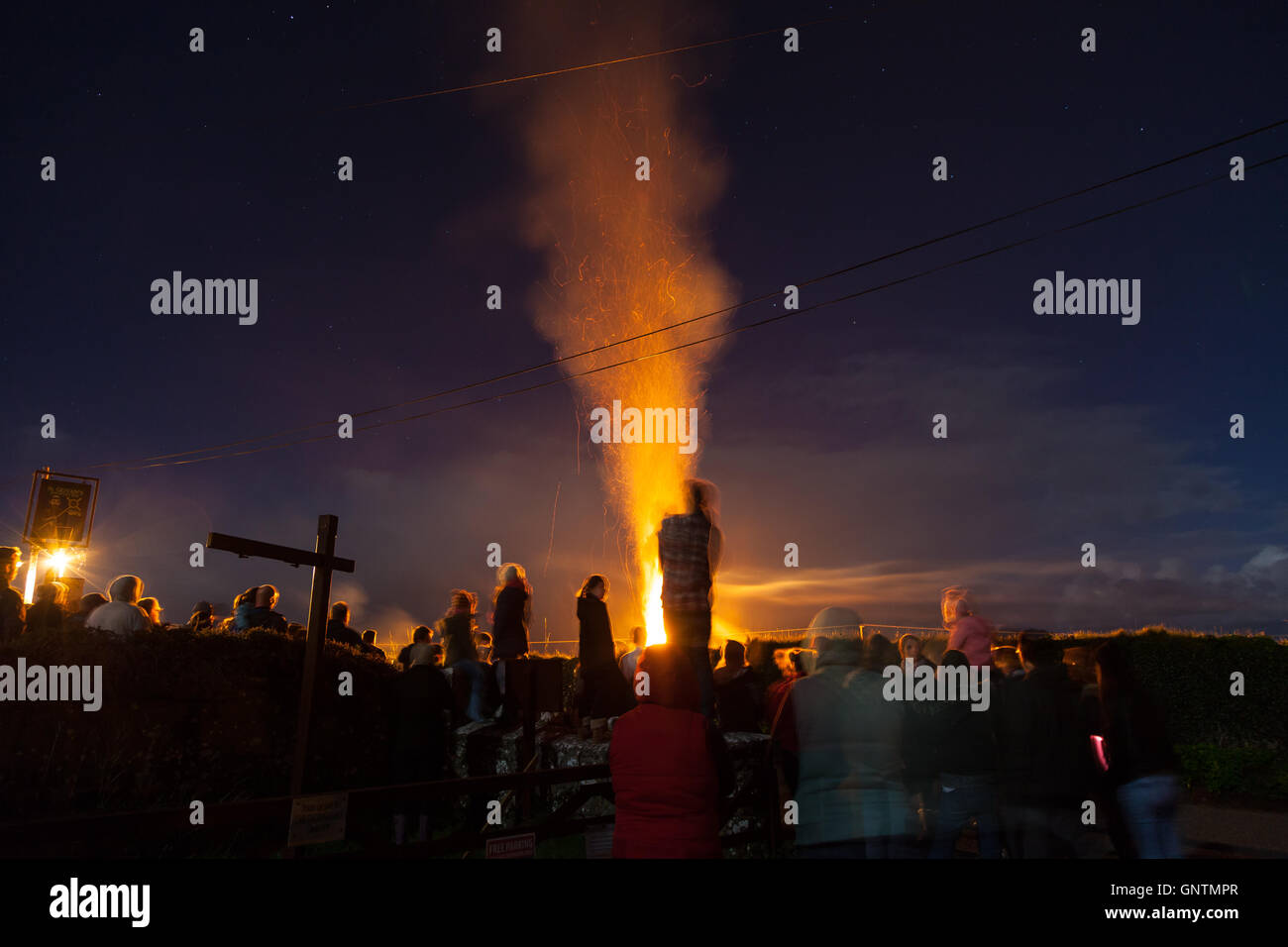 Bonfire night with crowd and fireworks in the UK Stock Photo - Alamy