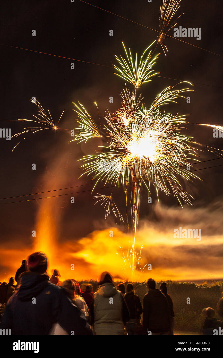 Bonfire night with crowd and fireworks in the UK Stock Photo - Alamy