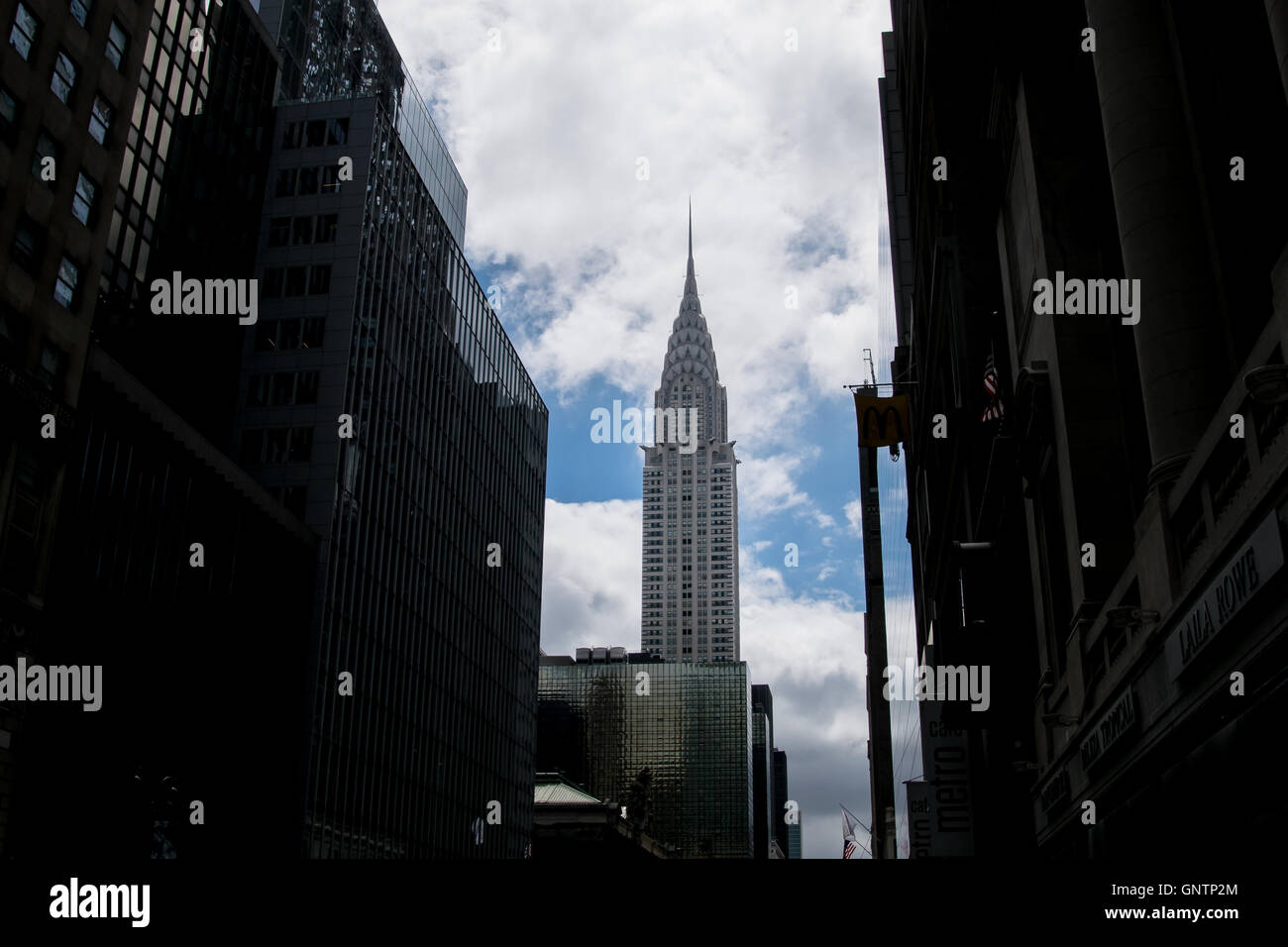 Well Lit, Iconic Chrysler Building framed by the dark buildings on the ...