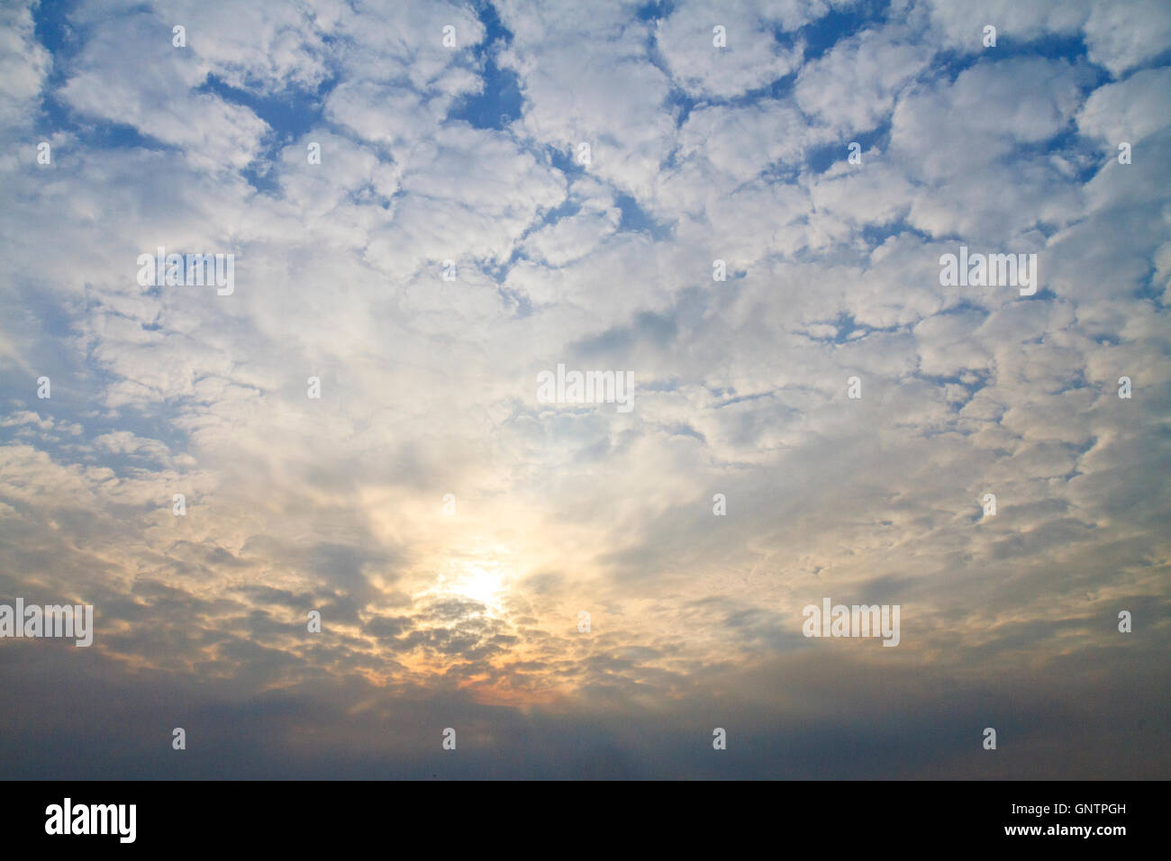 Unusual clouds at sunset Stock Photo - Alamy