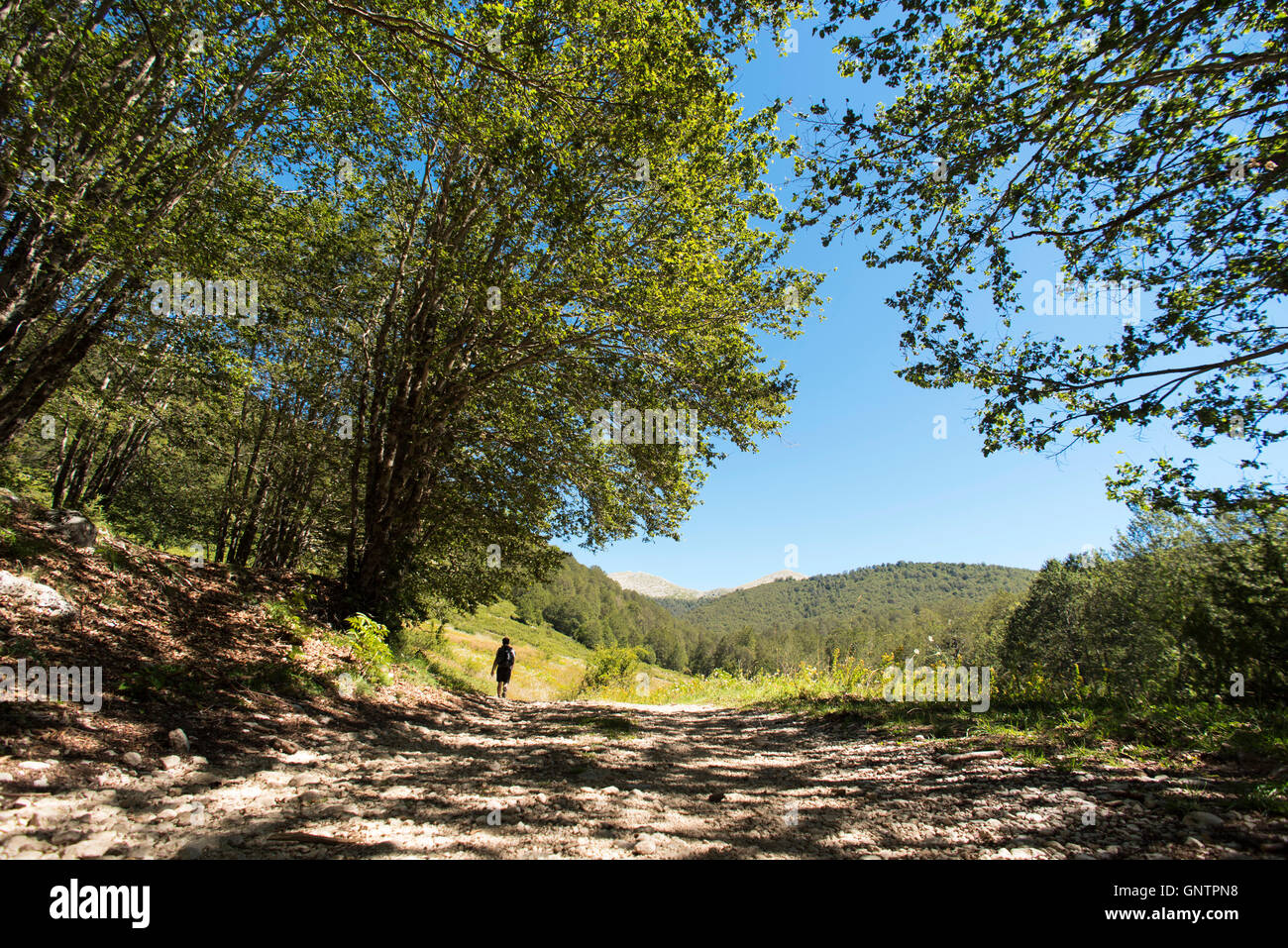 Man doing hiking on mountain, trekking Abruzzo, Italy Stock Photo - Alamy