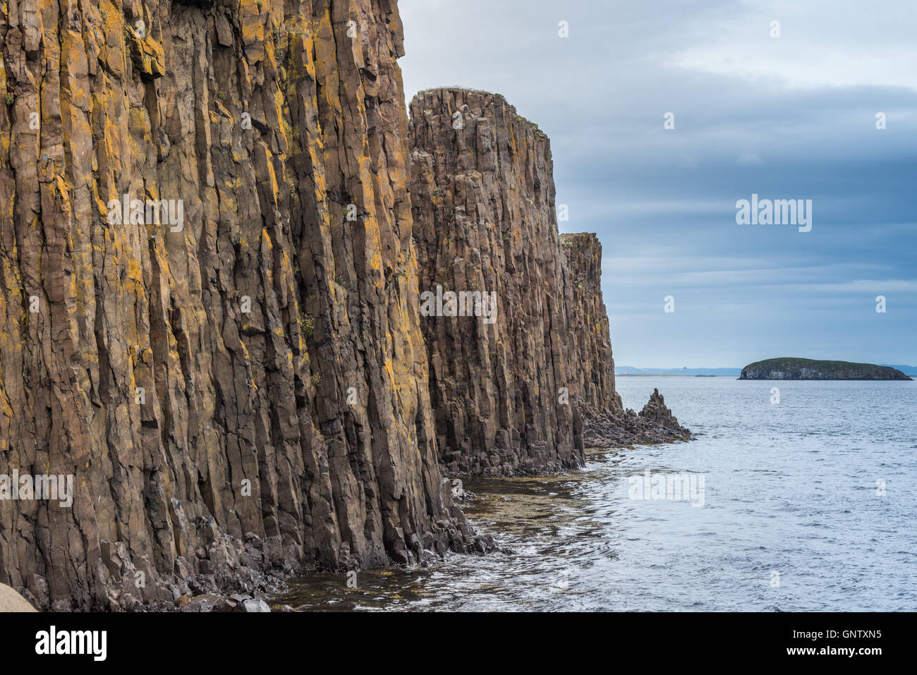 Basalt column rock formations at the Stykkisholmur harbor ...