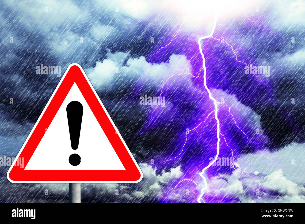 Thunderstorm with attention traffic sign Stock Photo - Alamy