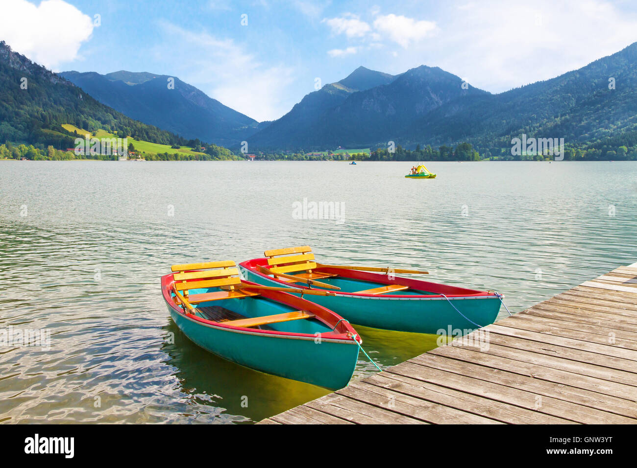 Colorful row boats on lake Schliersee Stock Photo - Alamy
