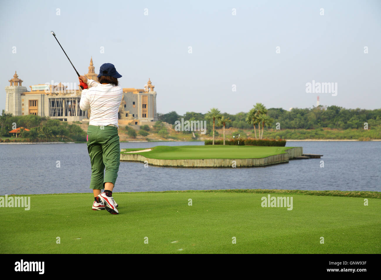 Rear view teeing off golf hi-res stock photography and images - Alamy