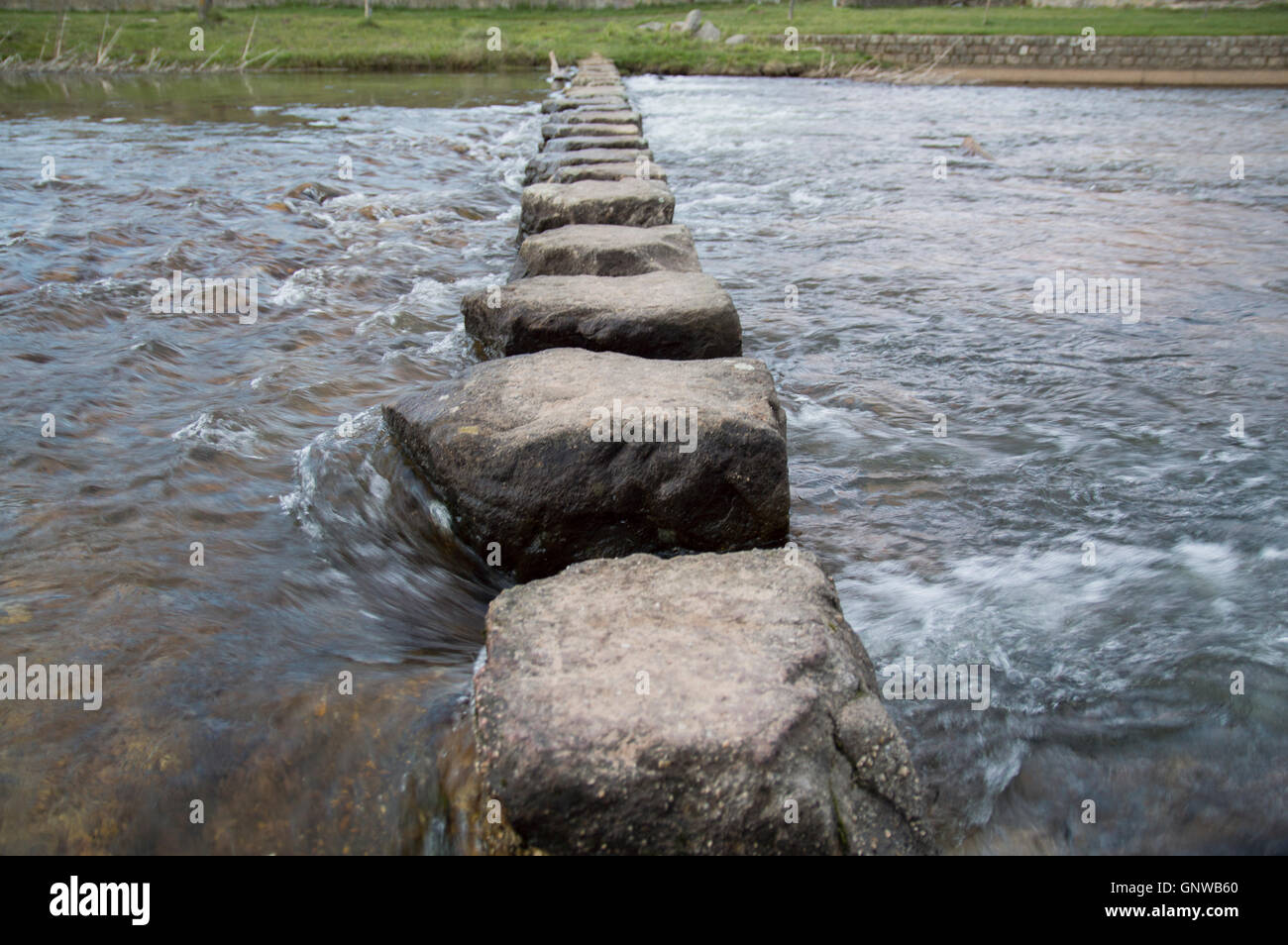 Crossing the river Stock Photo - Alamy