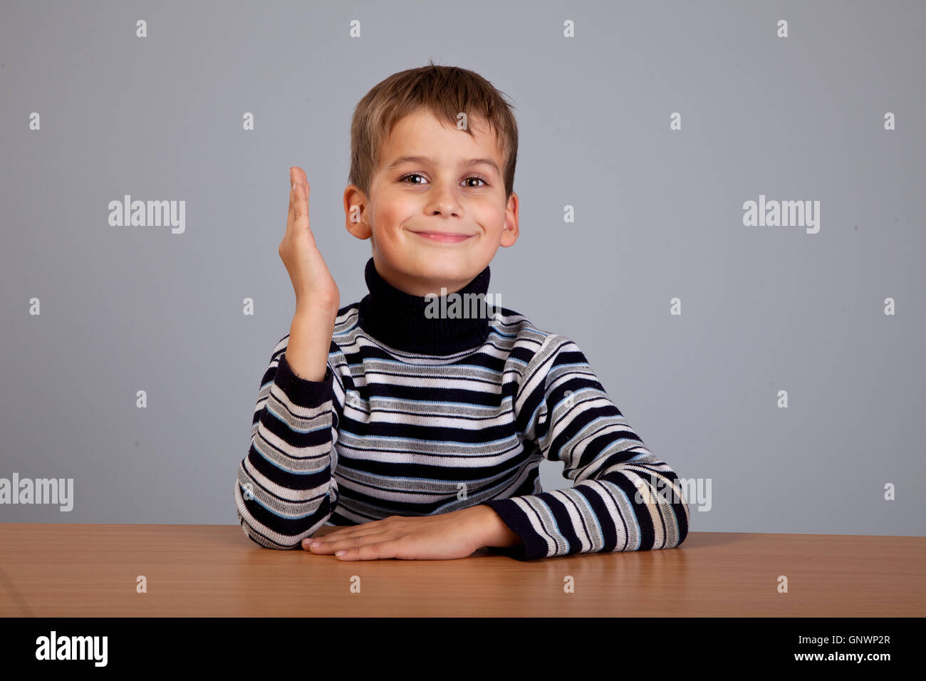 Cheerful Schoolboy ready to answer question Stock Photo - Alamy