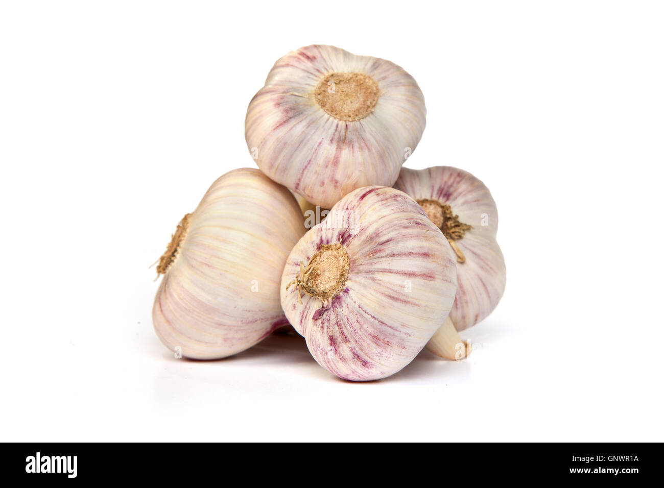 Group of garlics . A heads of garlics isolated Stock Photo - Alamy