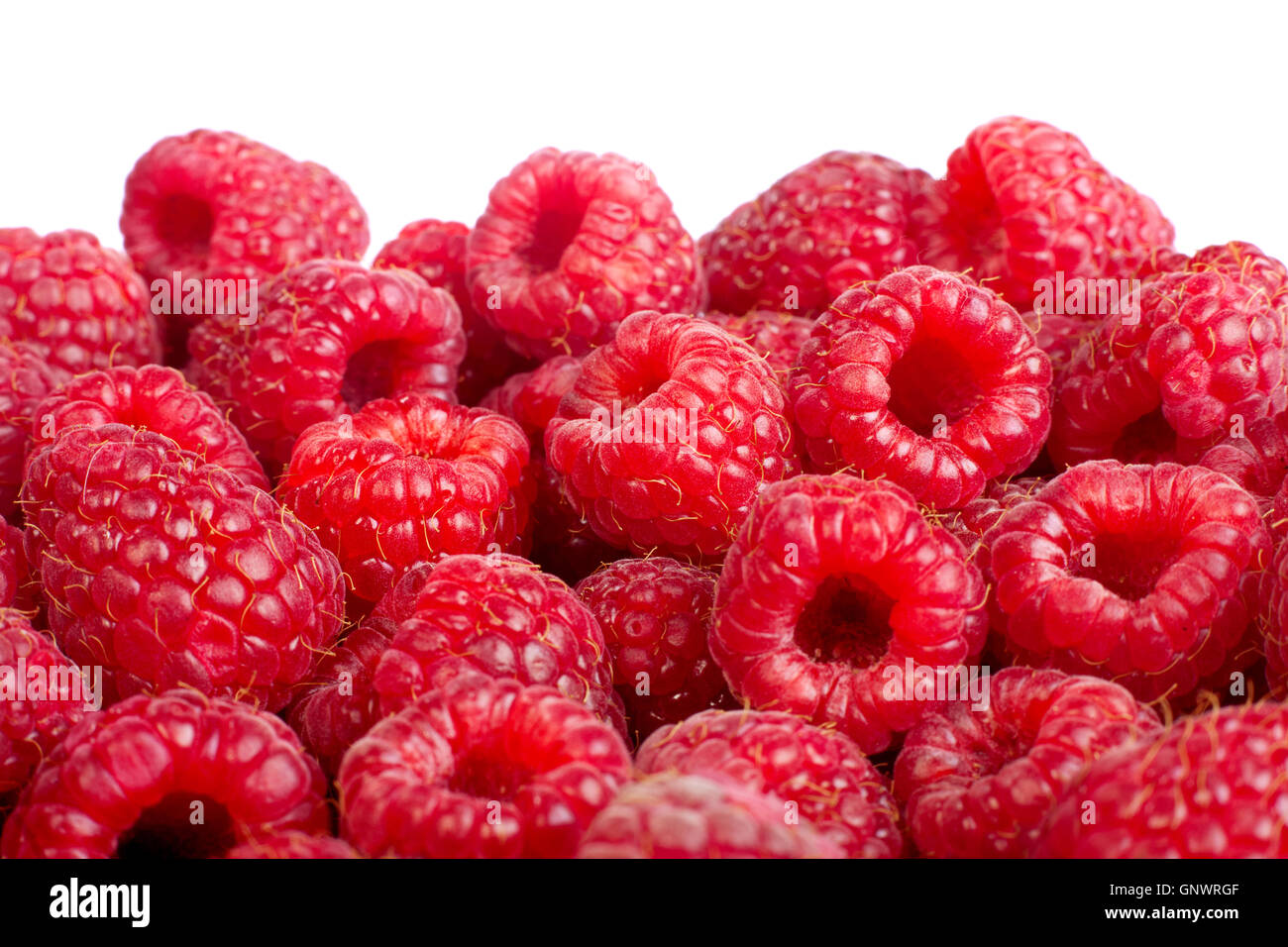 Ripe raspberries fruit background. ∩┐╜solated on white Stock Photo - Alamy