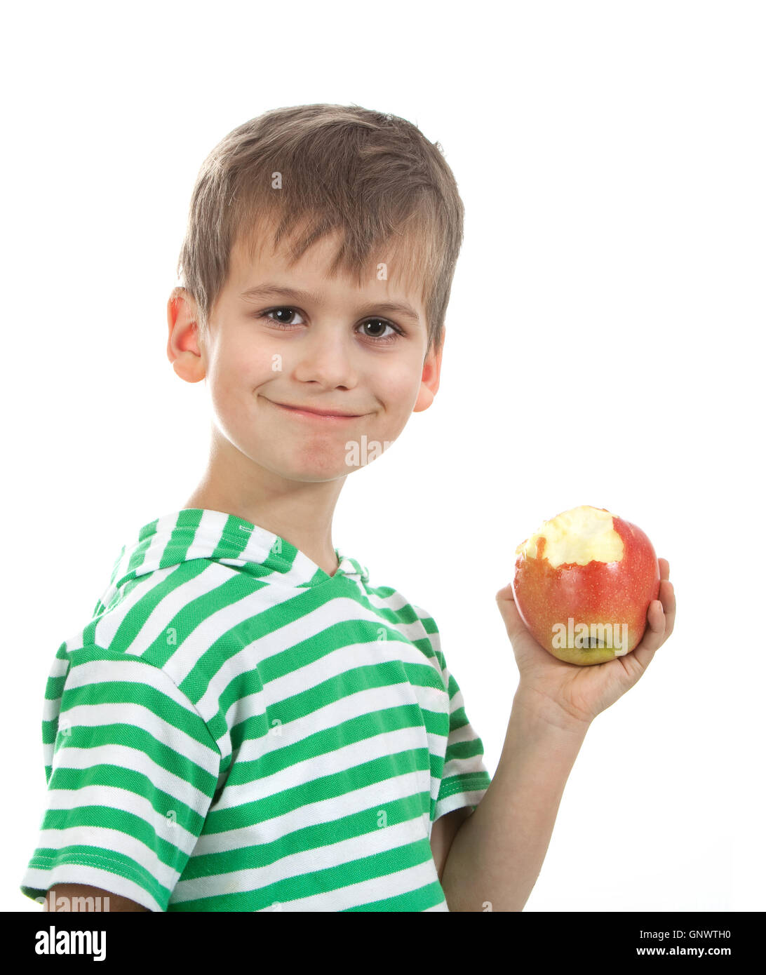 Boy holding an apple Stock Photo - Alamy