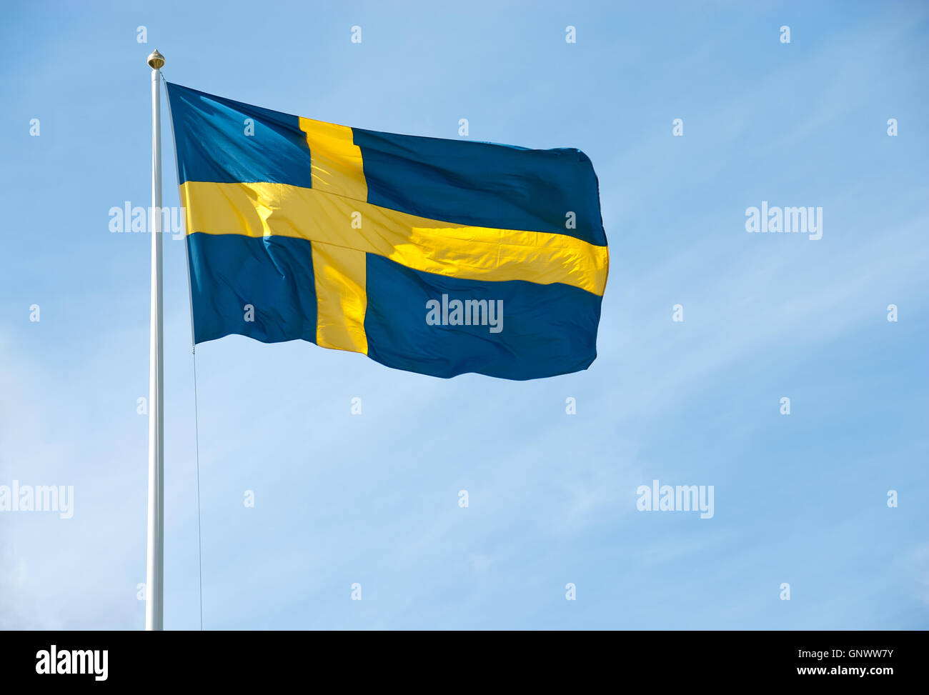Flag of Sweden in the blue sky Stock Photo - Alamy