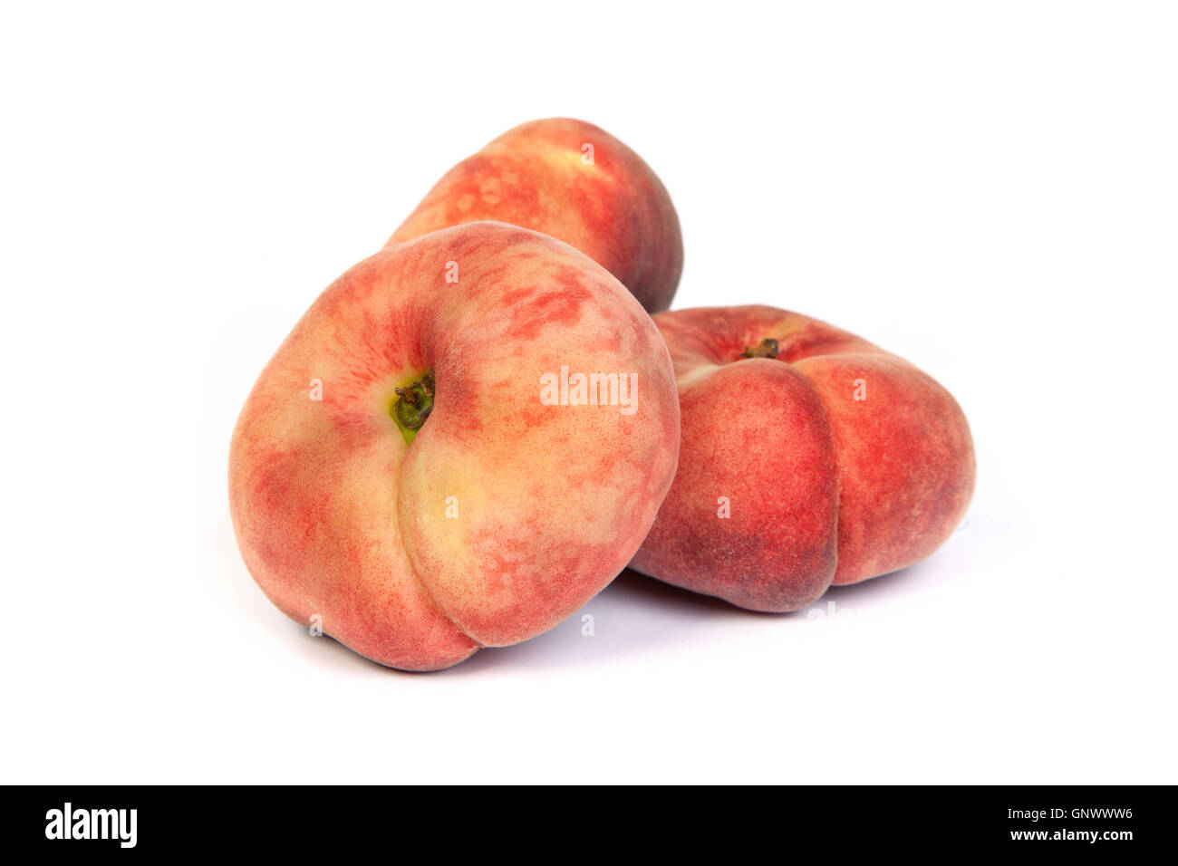 Three ripe fig peach on white Stock Photo - Alamy