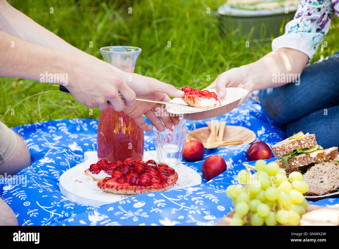 Woman eating fruit cake hi-res stock photography and images - Alamy