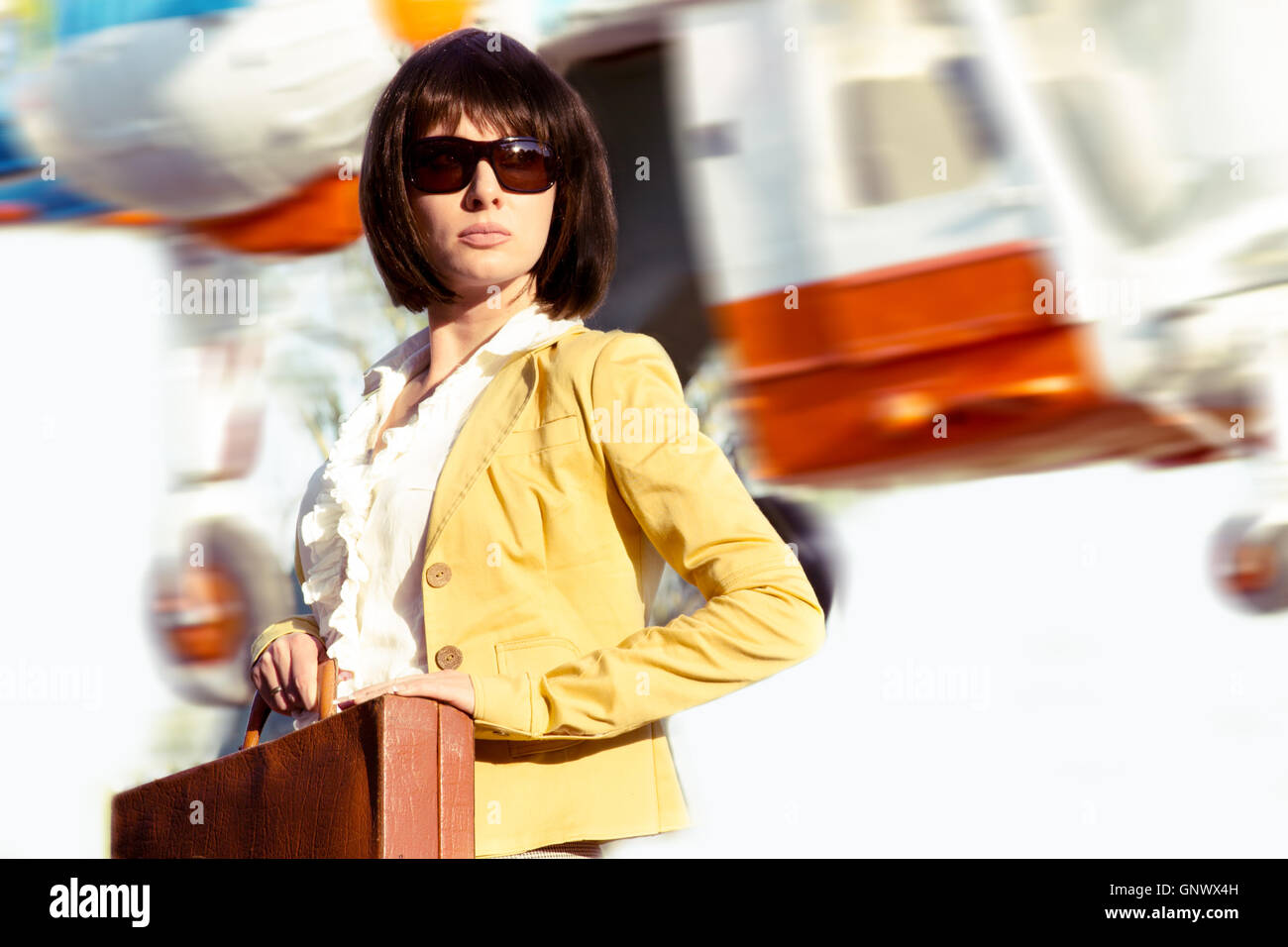 Business lady with case and flying helicopter Stock Photo - Alamy