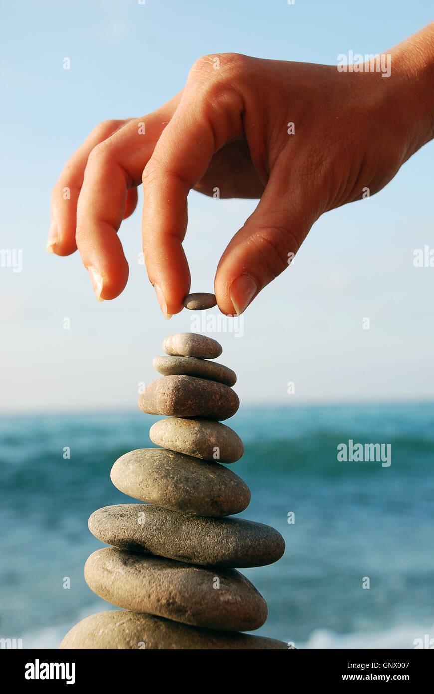 Balanced stone tower Stock Photo - Alamy