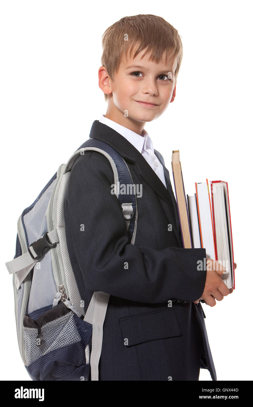 Boy holding books Stock Photo - Alamy